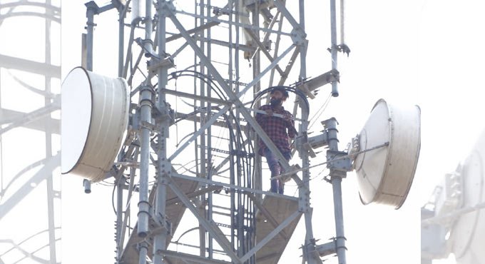 Youth climbs cell tower in Karimnagar to protest against girlfriend's ...